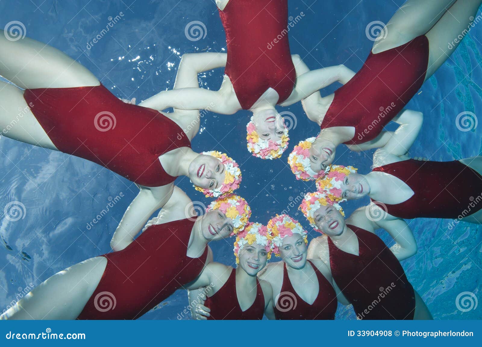 Happy Synchronized Swimmers Performing in Pool Stock Photo - Image of ...