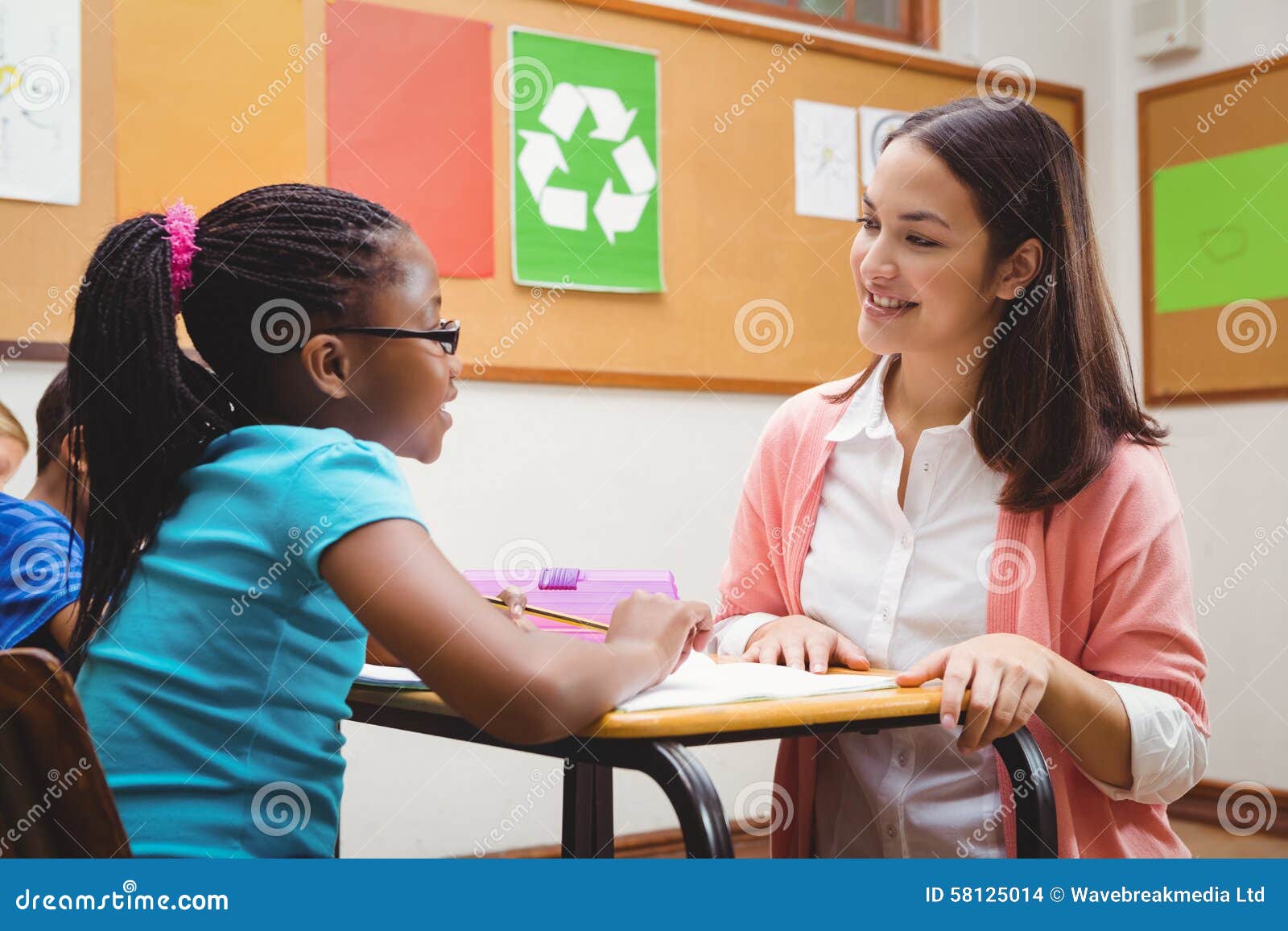 Happy Teacher Helping Her Students Stock Photo - Image of development ...