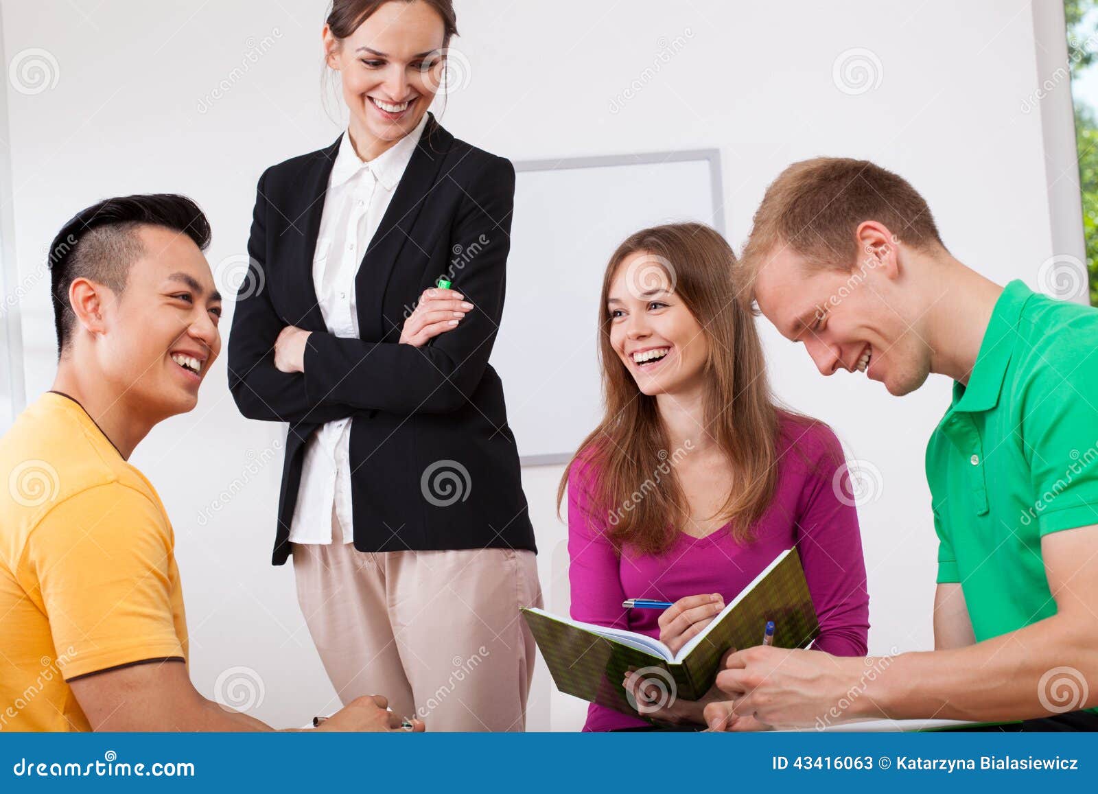 Happy Teacher and Her Students Stock Image - Image of conversation ...