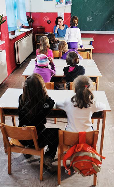 Happy Teacher in School Classroom Stock Photo - Image of gesture ...