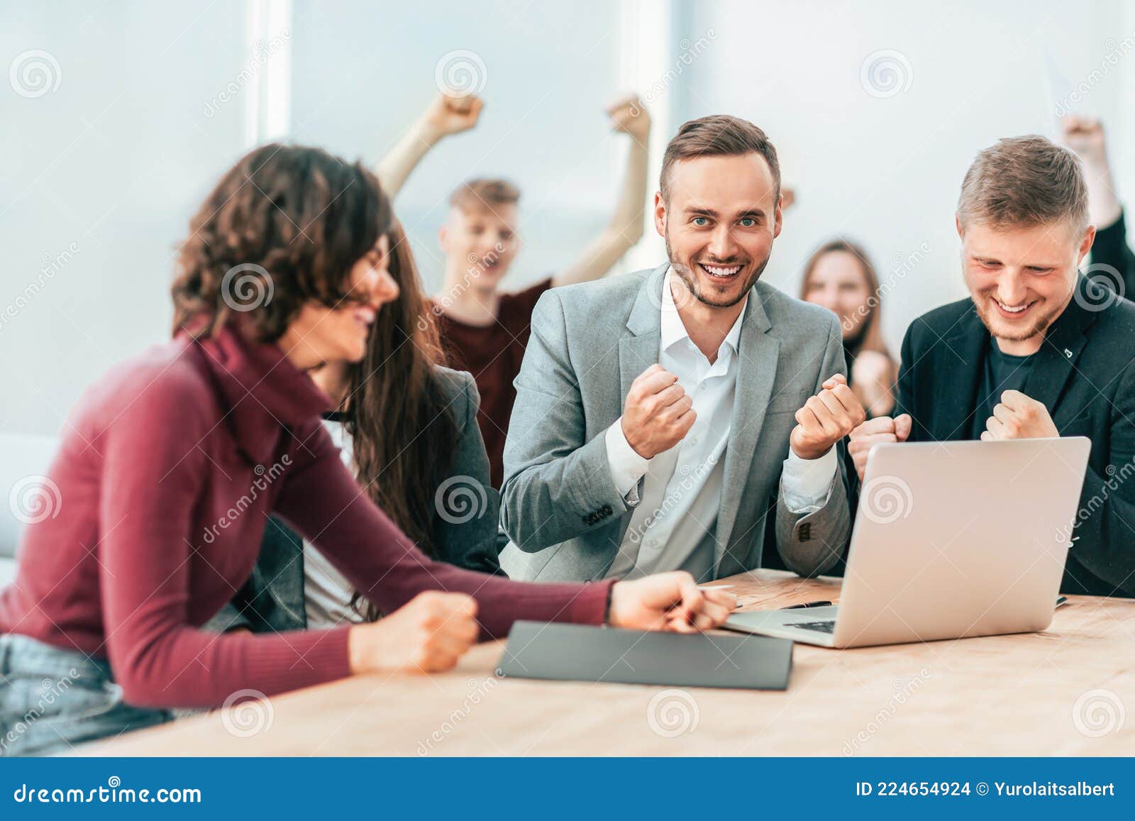 Happy Team of Employees Looking at Laptop Screen Stock Photo - Image of ...