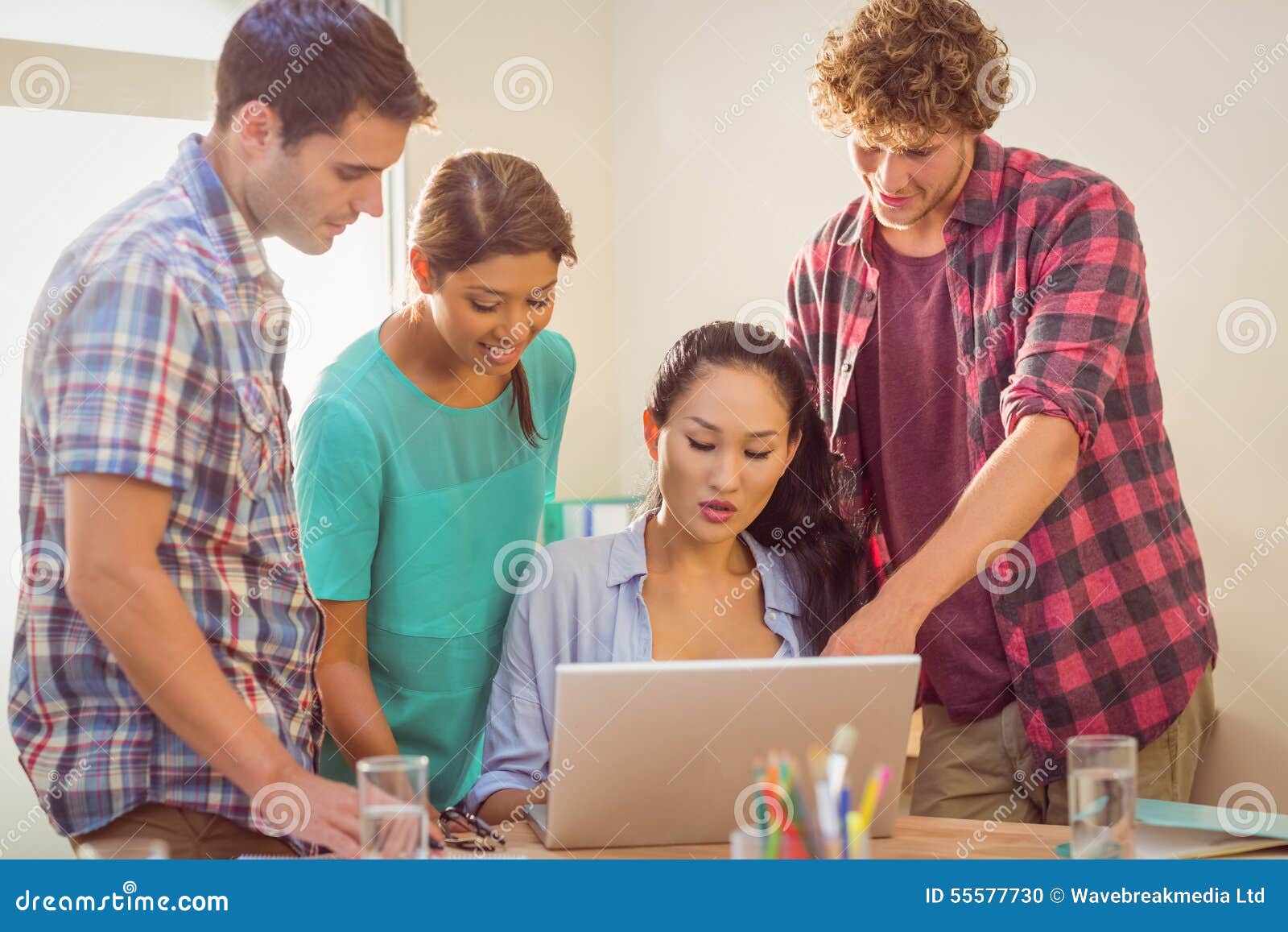 Happy Team Looking at Their Work Stock Photo - Image of designer ...