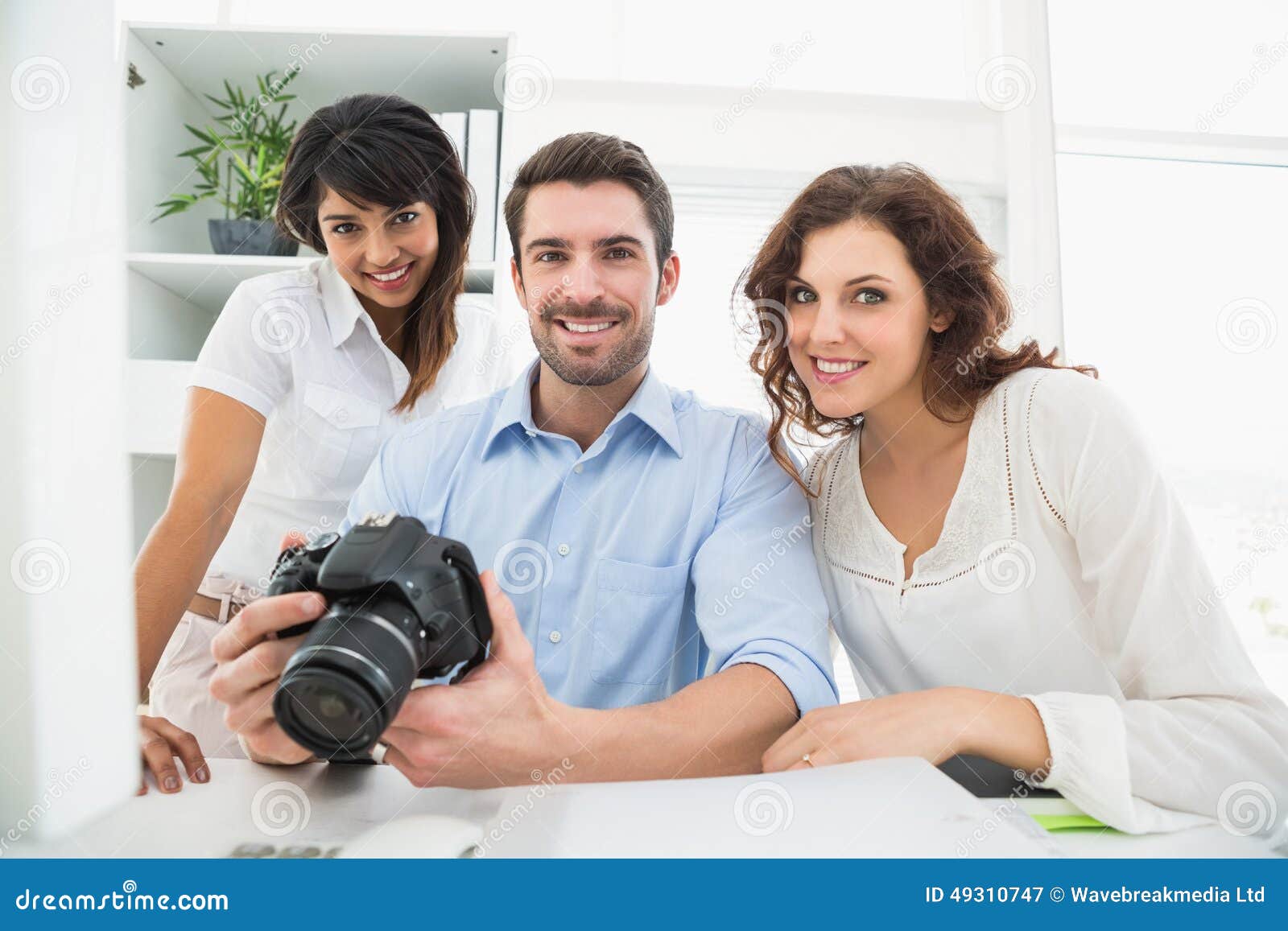 Happy Teamwork Posing with Digital Camera Stock Image - Image of office ...