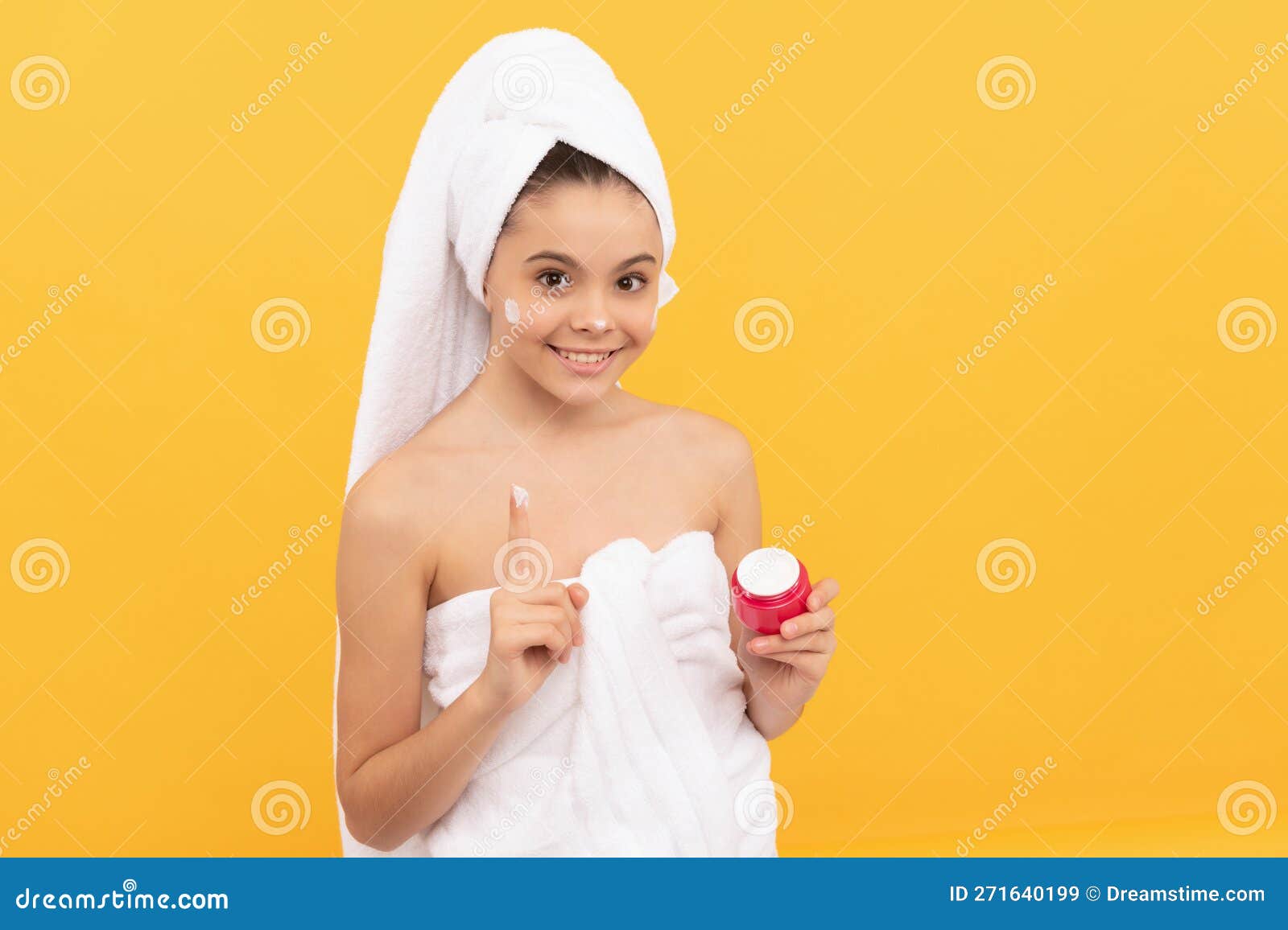 Happy Teen Girl In Shower Towel Apply Facial Cream Thumb Up Stock