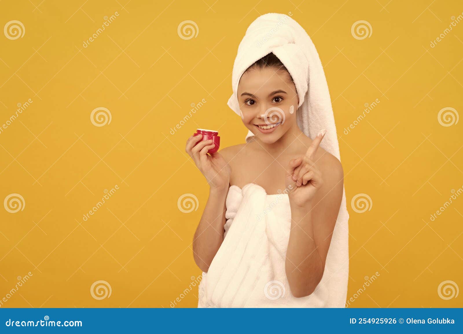 Happy Teen Girl In Shower Towel Applying Facial Cream Copy Space Stock