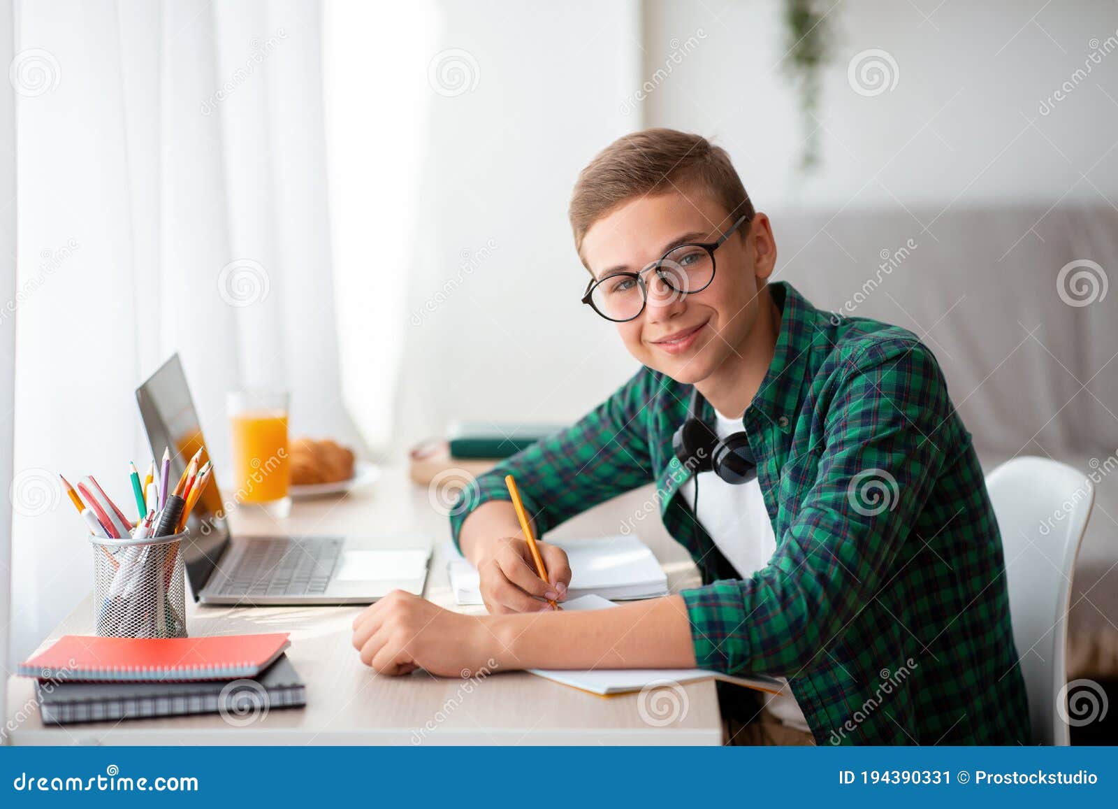 Happy Teen Guy Doing Homework at Home Stock Image - Image of sitting ...