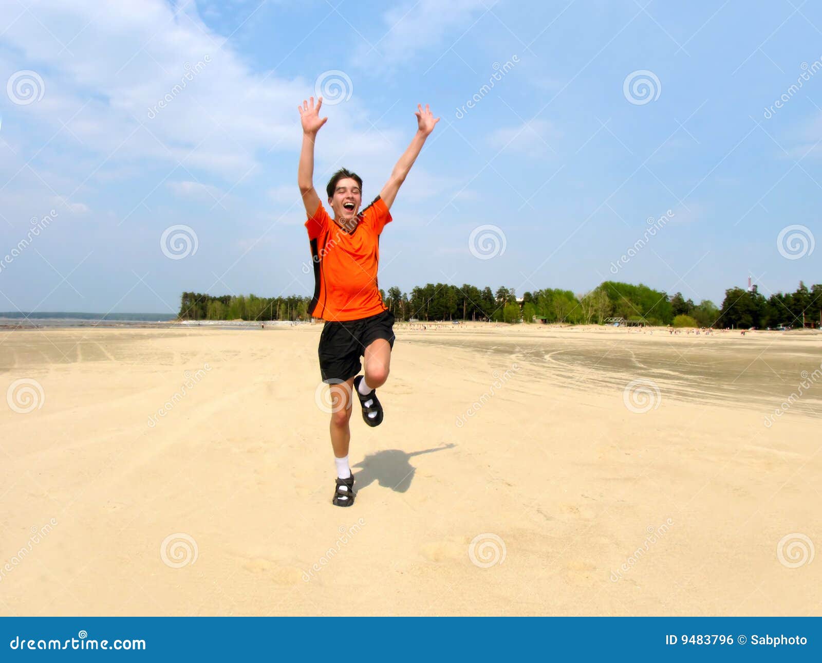 Happy teenager running stock photo. Image of expression - 9483796