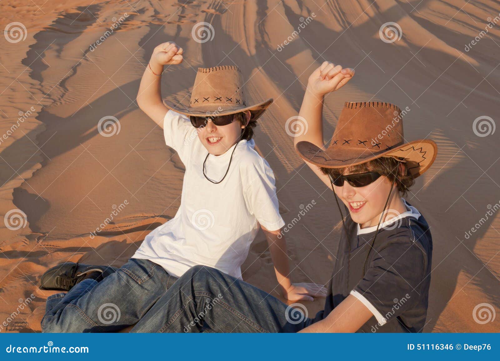 Happy Teens in a Desert stock photo. Image of destination - 51116346