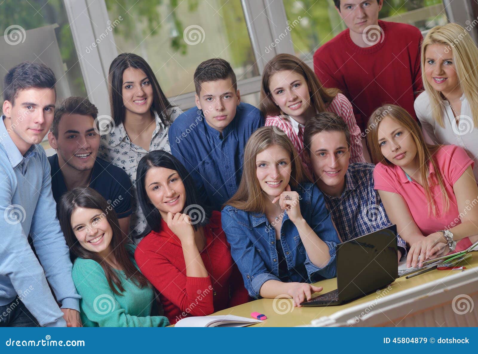 Happy Teens Group in School Stock Image - Image of book, library: 45804879