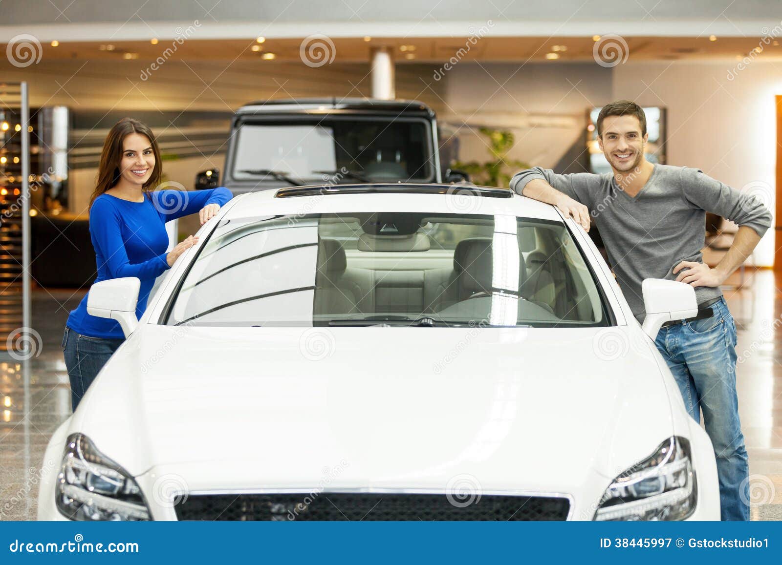 Happy with their new car. stock image. Image of industry - 38445997