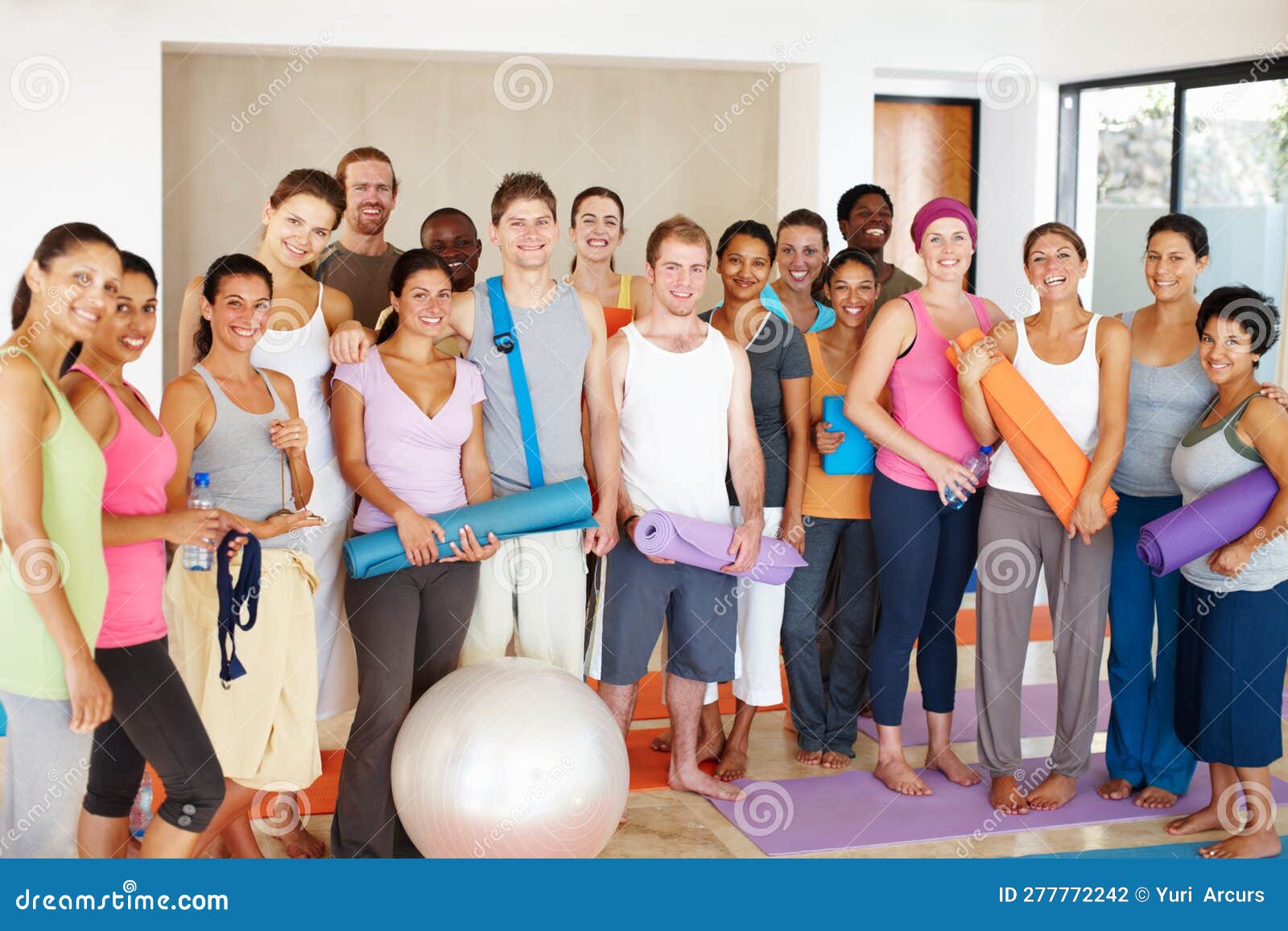 Happy in Their Yoga Class. Portrait of a a Group of Yoga Enthusiasts ...