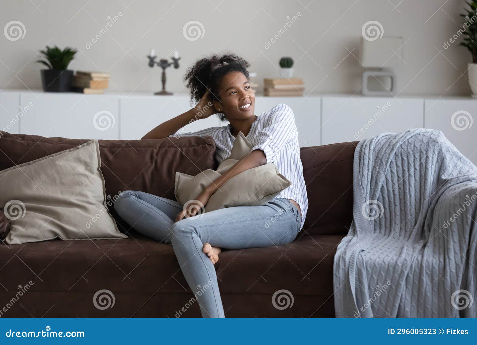 Happy Thoughtful Young Black Woman, African Girl Relaxing on Couch ... Happy Thoughtful Young Black Woman, African Girl Relaxing on Couch ...