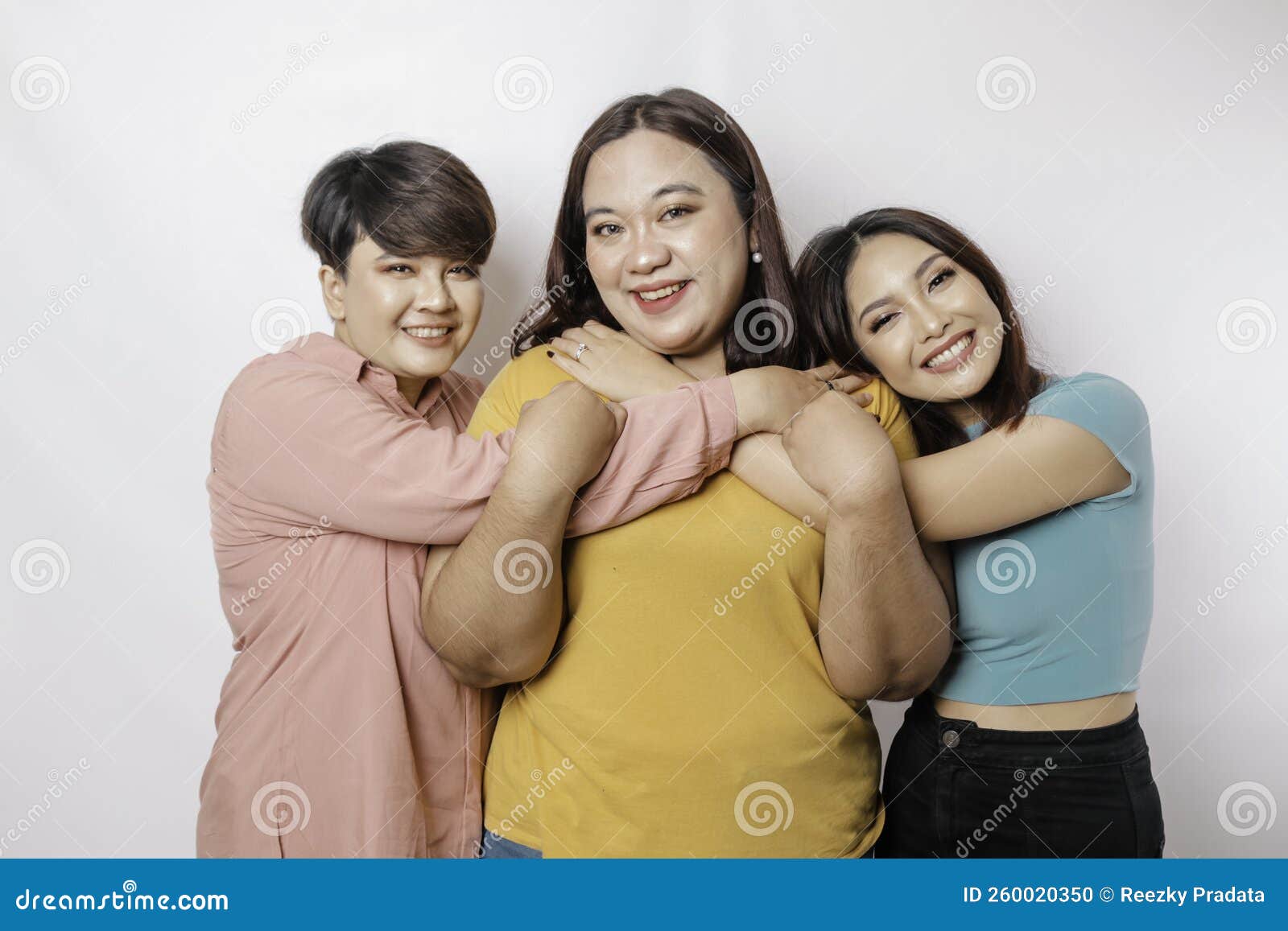 Happy Three Close Friends Hugging Each Other Showing Friendly Gesture ...