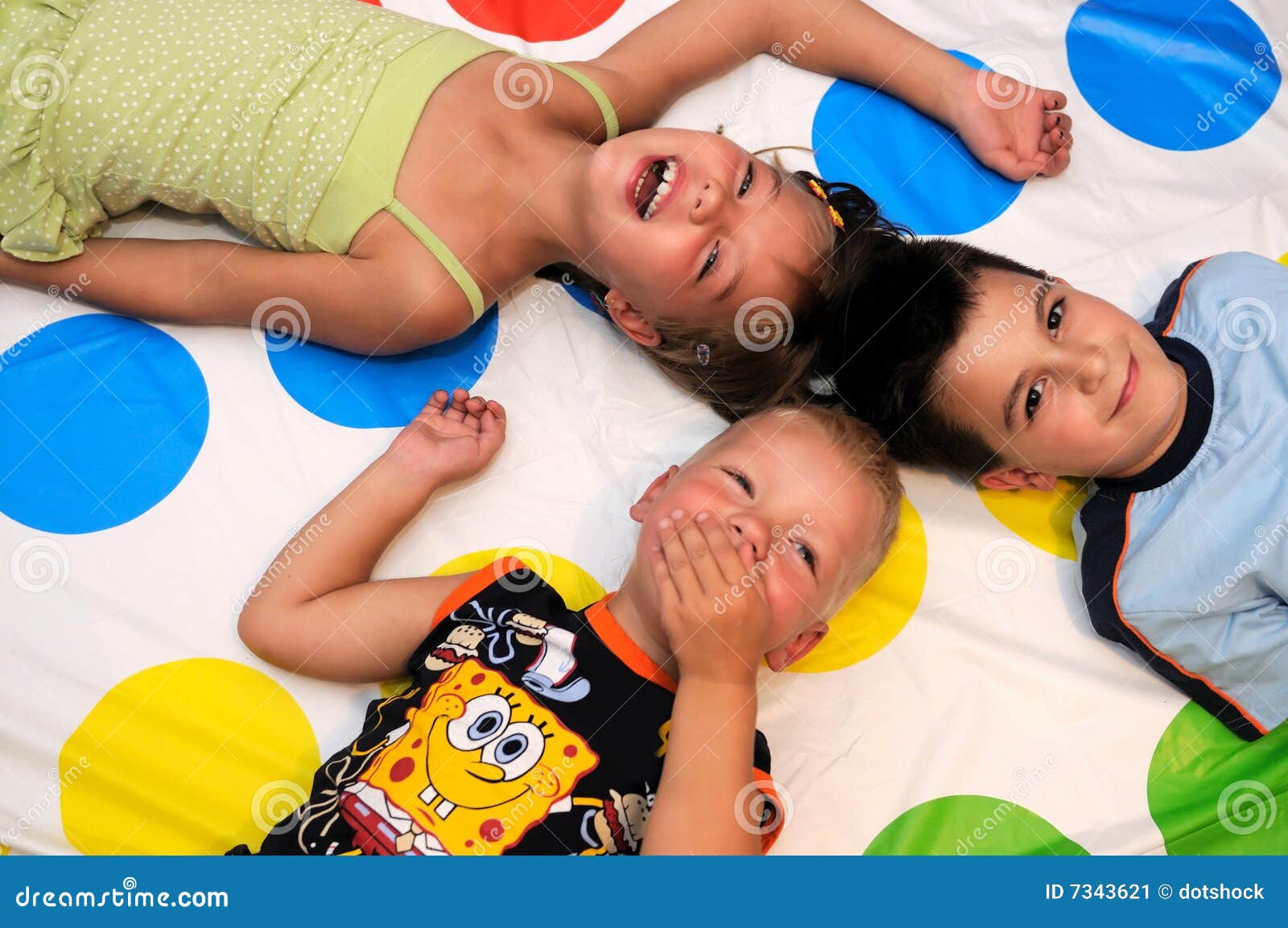 Happy Three Kids Playing Together Stock Image - Image of happy, looking ...