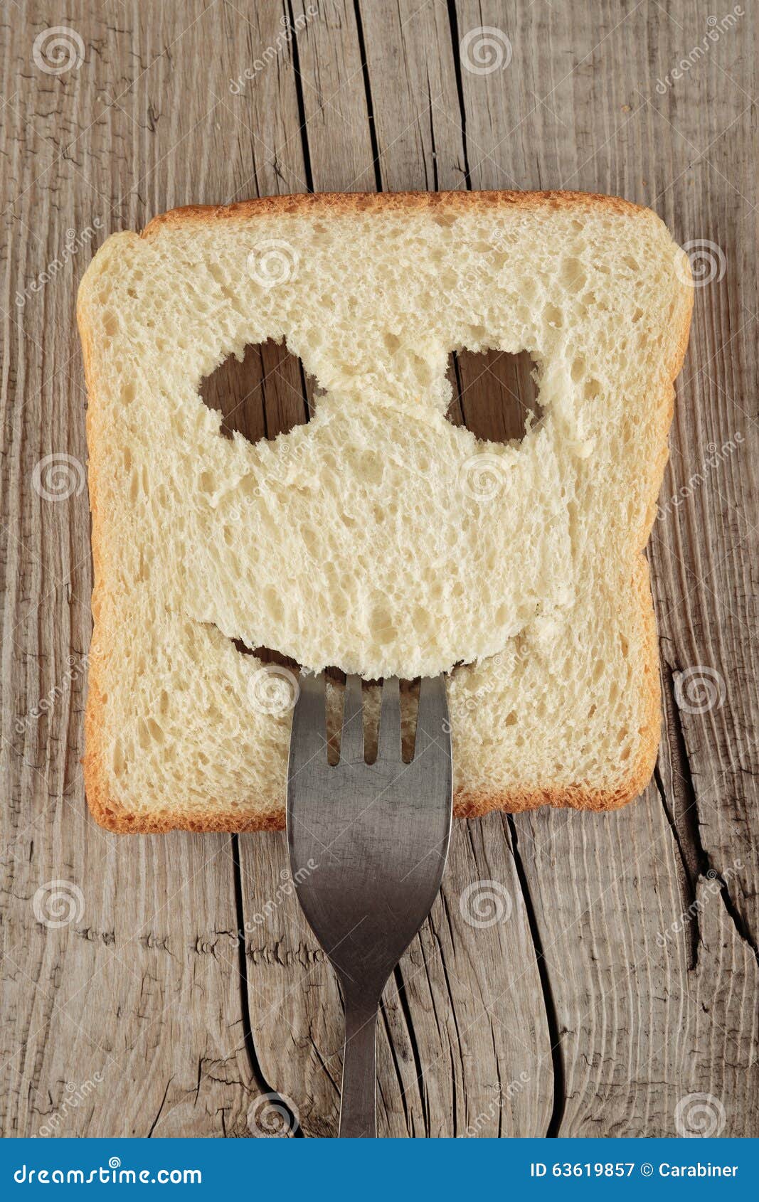 Happy Toast with a Fork in Her Mouth on a Wooden Stock Image - Image of ...
