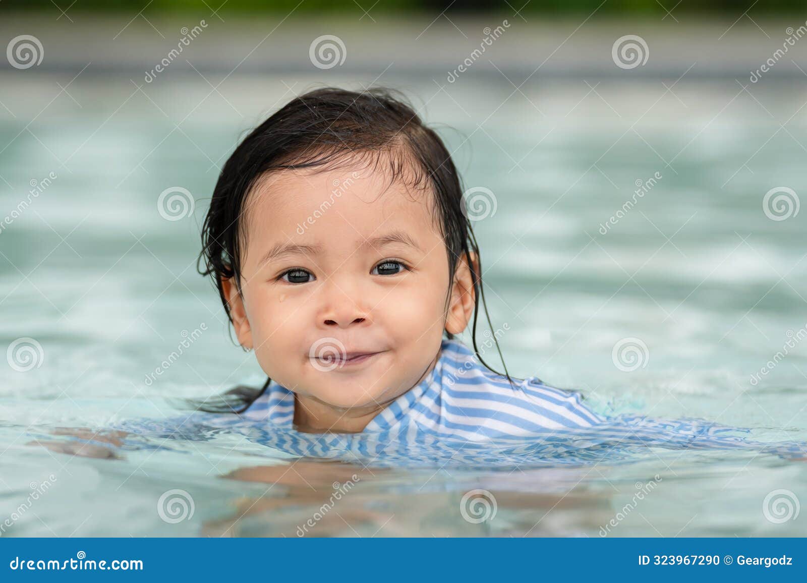 Happy Toddler Baby Float in Swimming Pool Stock Photo - Image of face ...