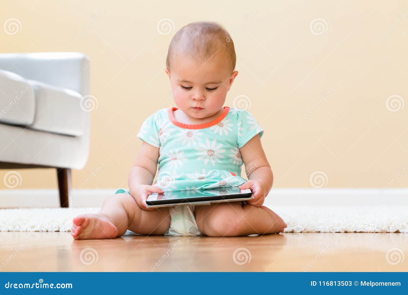 Happy Toddler Girl Playing with Her Tablet Stock Image - Image of ...