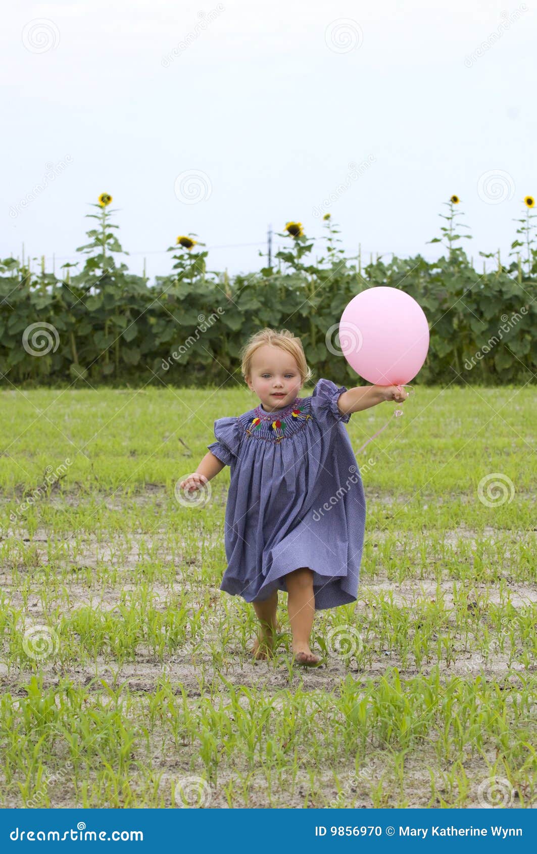 Happy Toddler Running with Balloon Stock Photo - Image of colorful ...