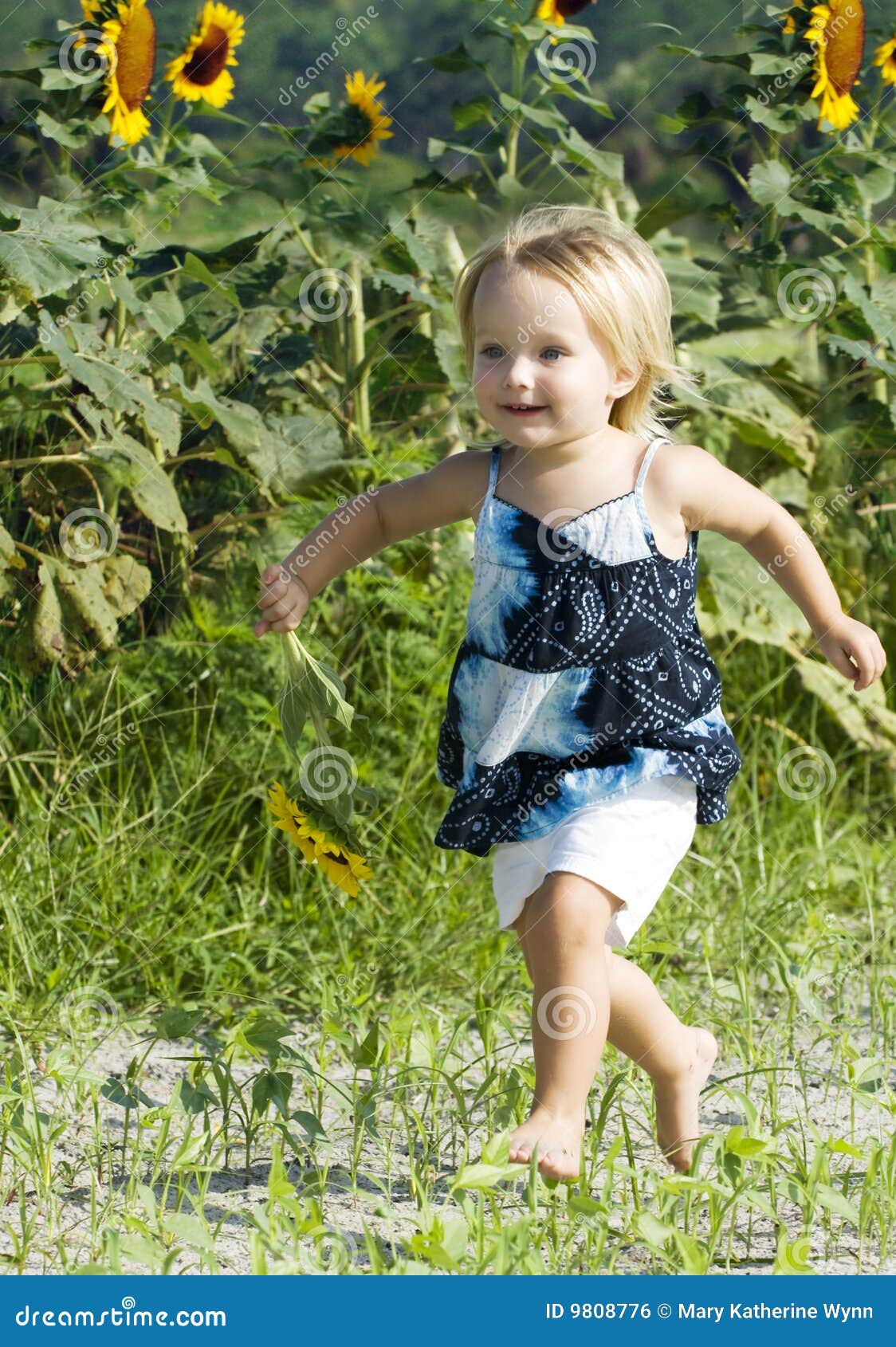 Happy Toddler Running in Field Stock Photo - Image of life, emotion ...