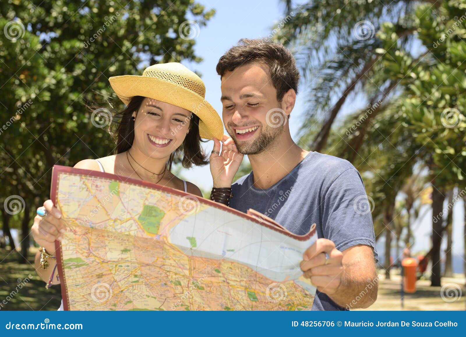 Happy Tourist Couple with Map Stock Photo - Image of happiness, smiling ...