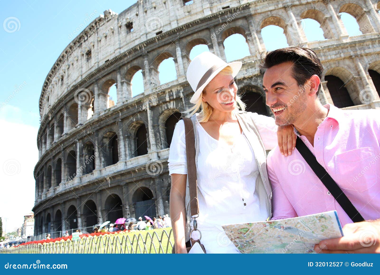 Happy Tourists Visiting Coliseum with Map Stock Image - Image of ...