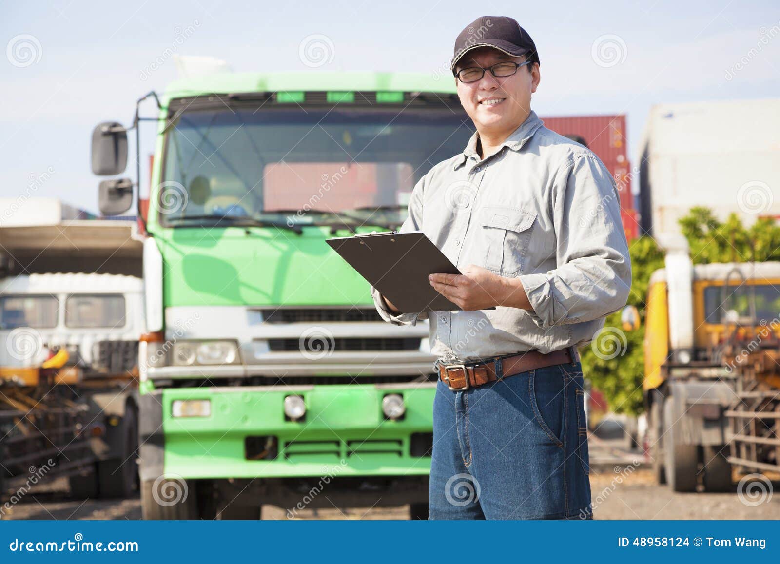 Happy Truck Driver Writing on Document Stock Photo - Image of chinese ...