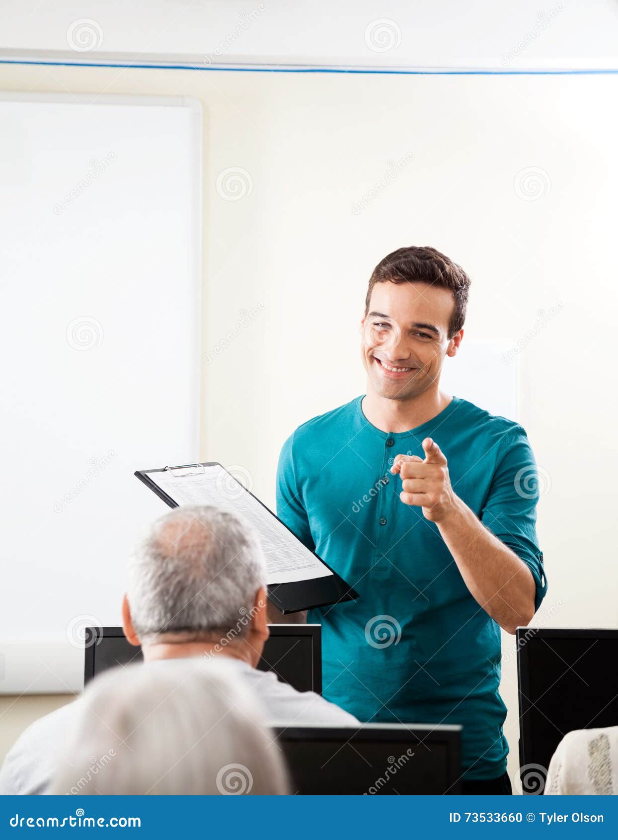 Happy Tutor Taking Lecture in Computer Class Stock Photo - Image of ...