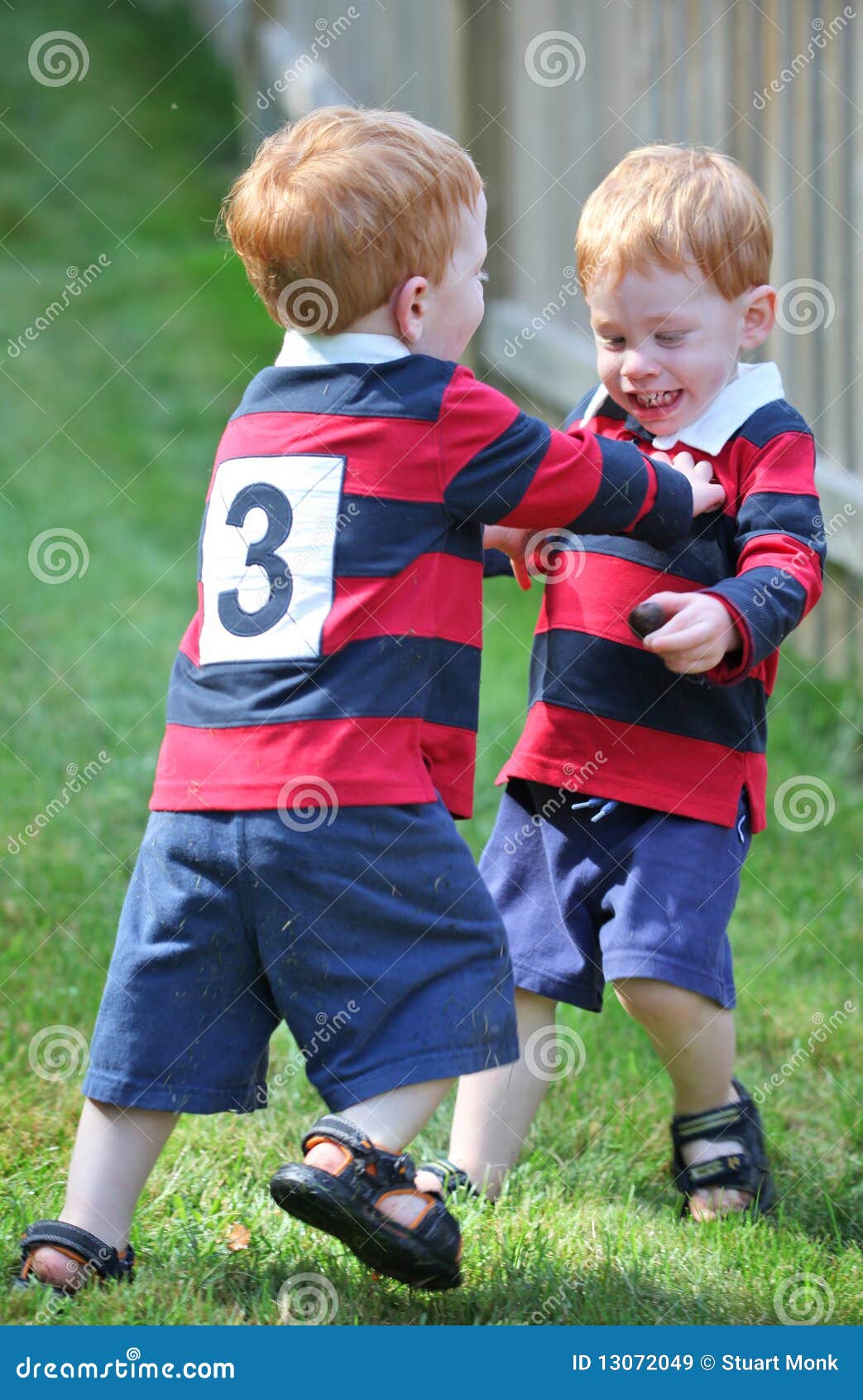 Happy twins stock image. Image of playtime, shirt, playful - 13072049