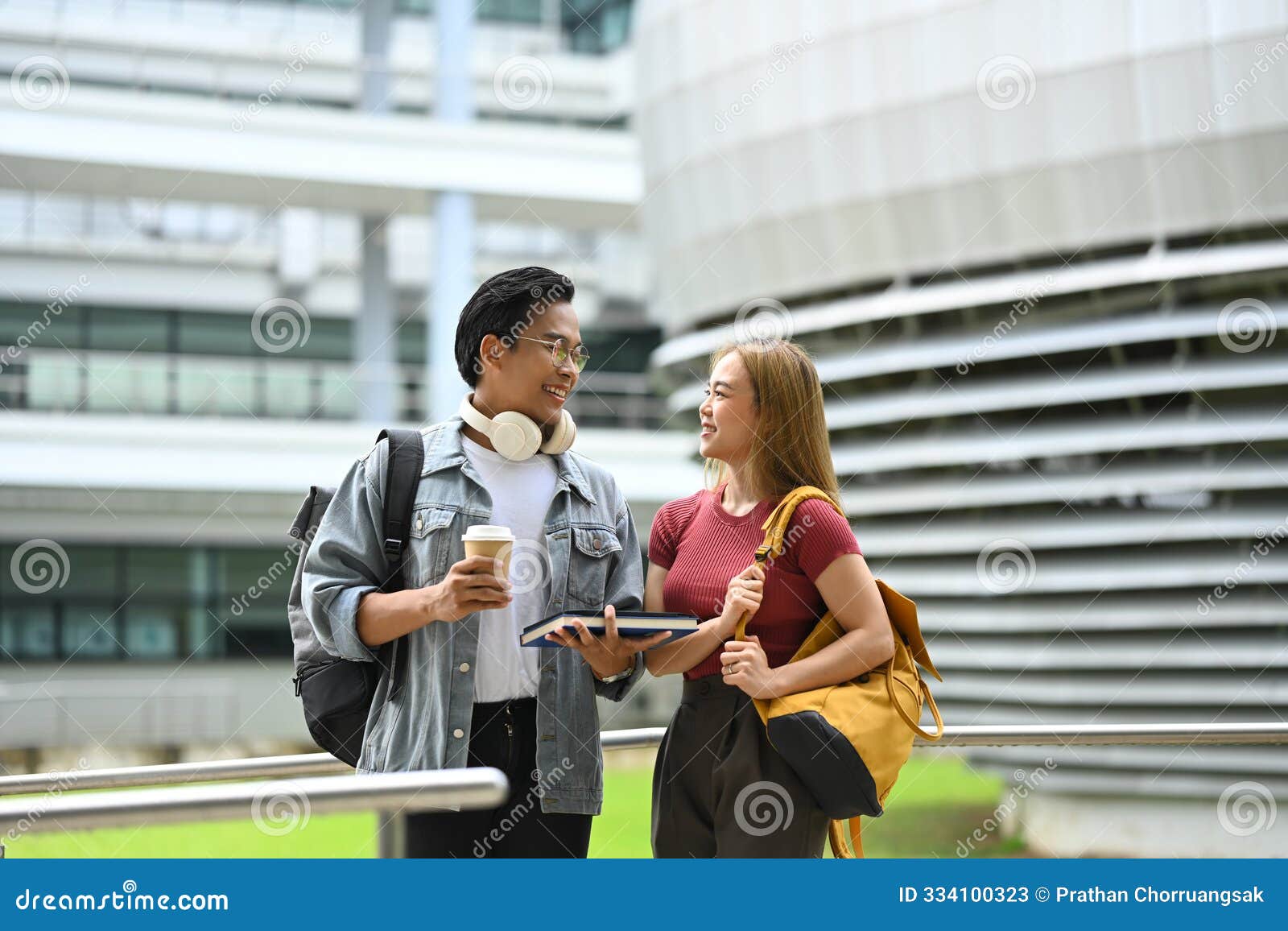 Happy University Students Talking and Walking on Campus. Education and ...