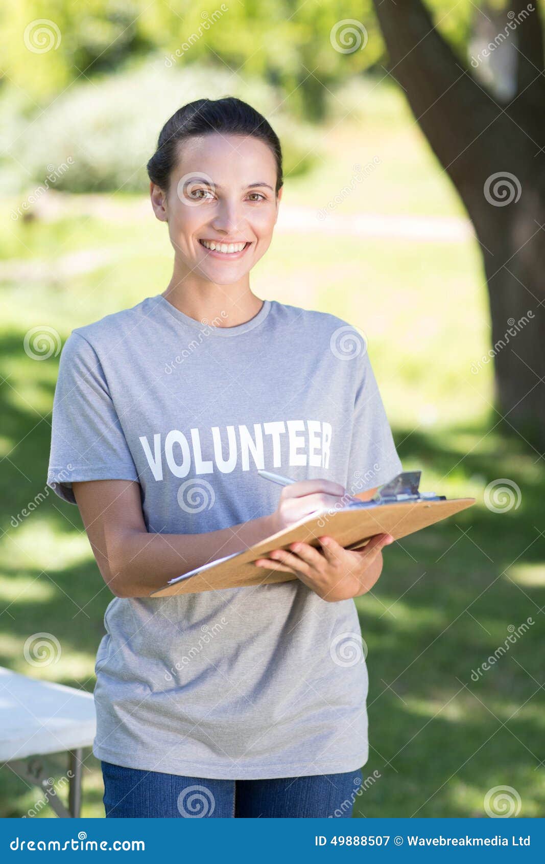 Happy Volunteer in the Park Stock Image - Image of female, altruism ...