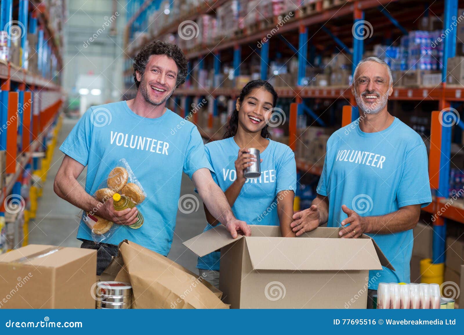 Happy Volunteer are Posing and Smiling during Work Stock Photo - Image ...