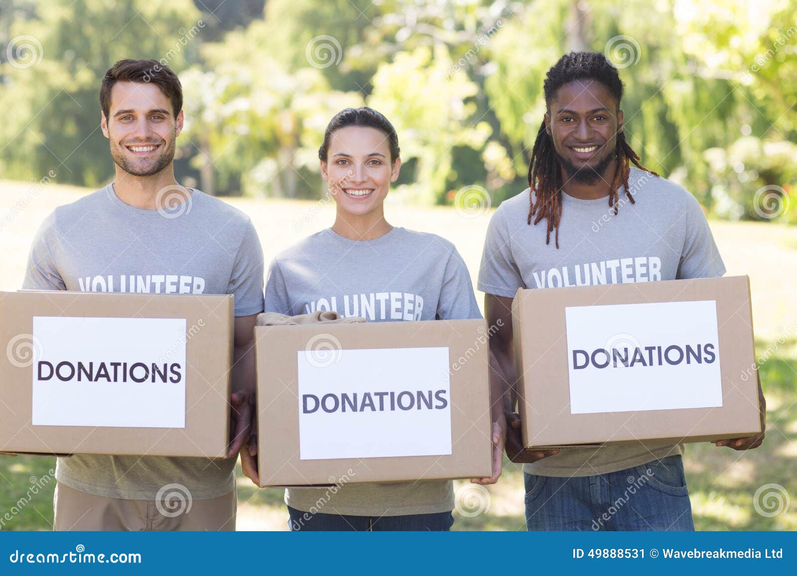 Happy Volunteers with Donation Boxes in Park Stock Image - Image of ...