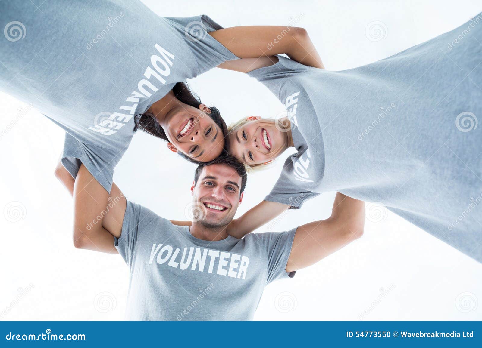 Happy Volunteers Forming Huddle Stock Photo - Image of moral ...