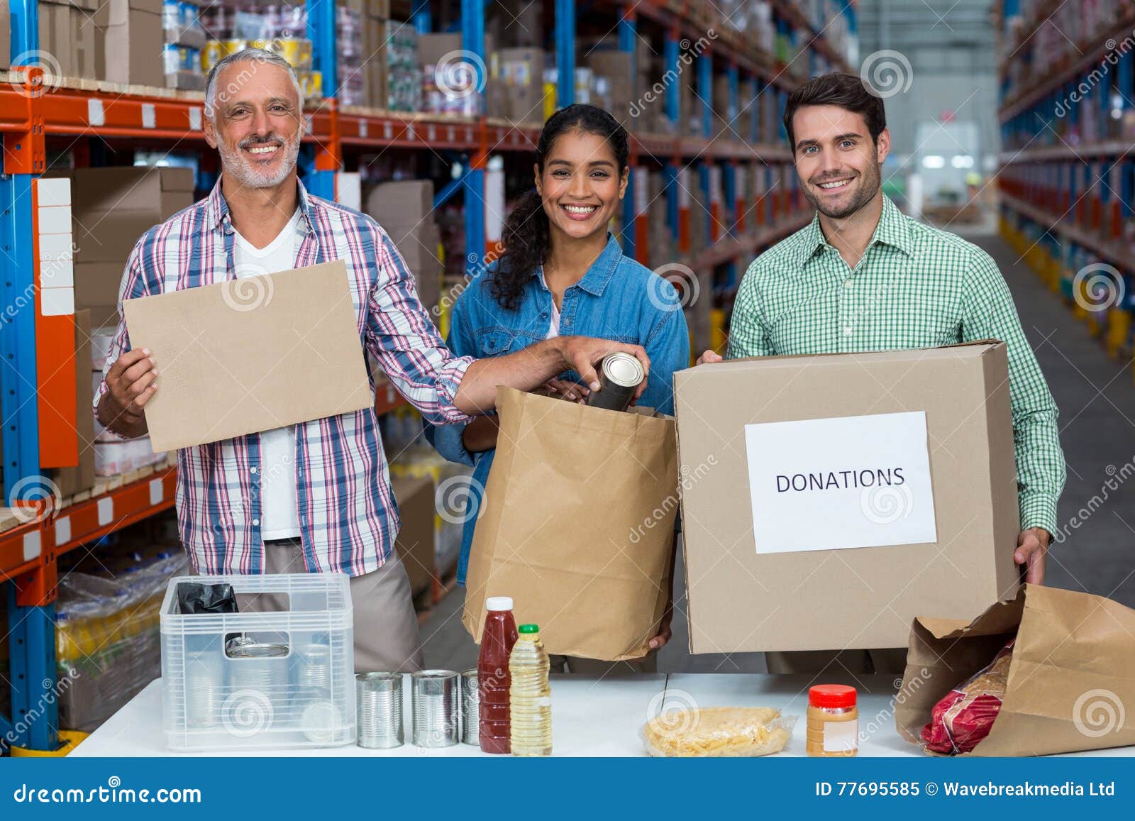 Happy Volunteers are Posing and Smiling during Work Stock Image - Image ...