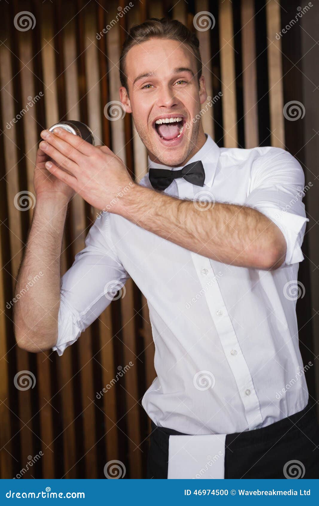 Happy Waiter Shaking Drink in Cocktail Shaker Stock Photo - Image of ...