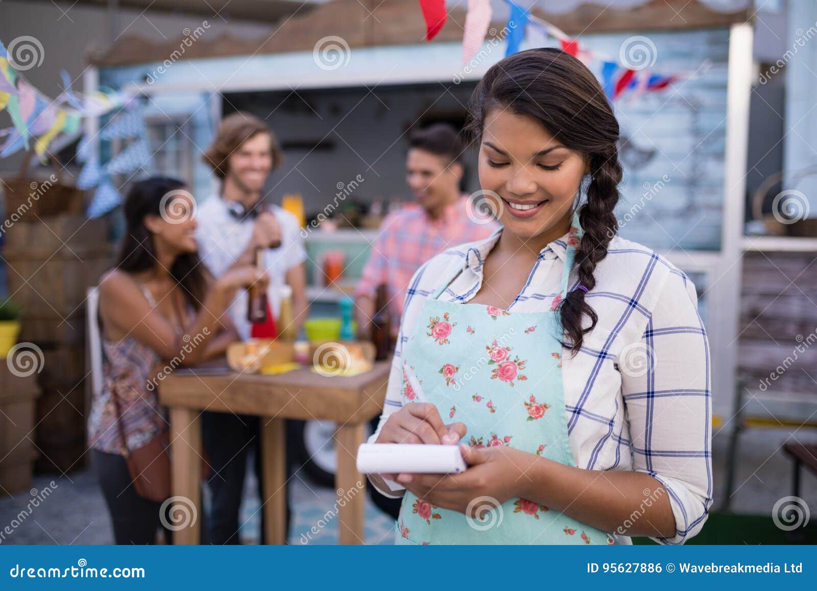 Happy Waitress Writing Order in Notepad Stock Photo - Image of ...