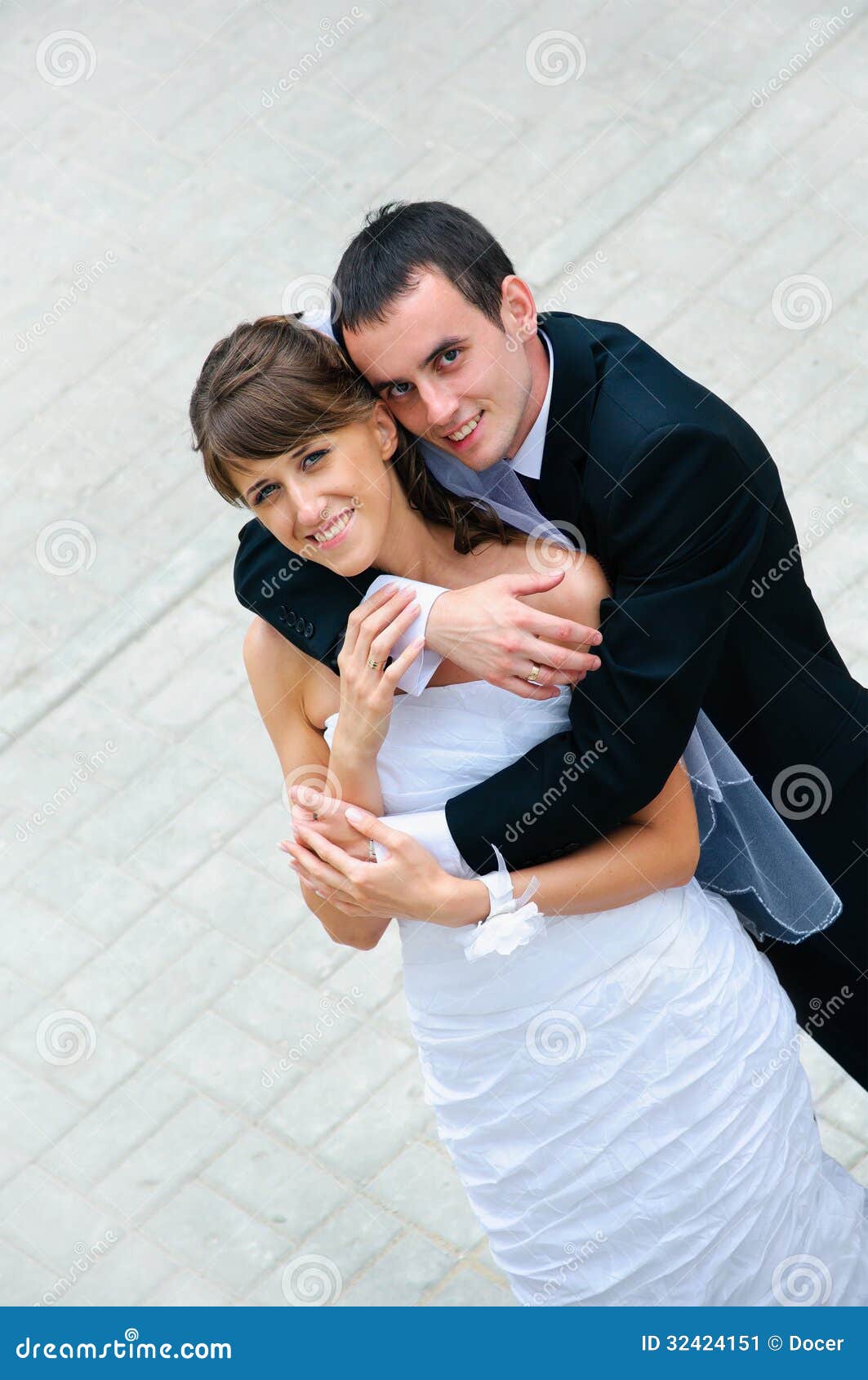 Happy Wedding Couple Standing and Embracing Stock Image - Image of ...
