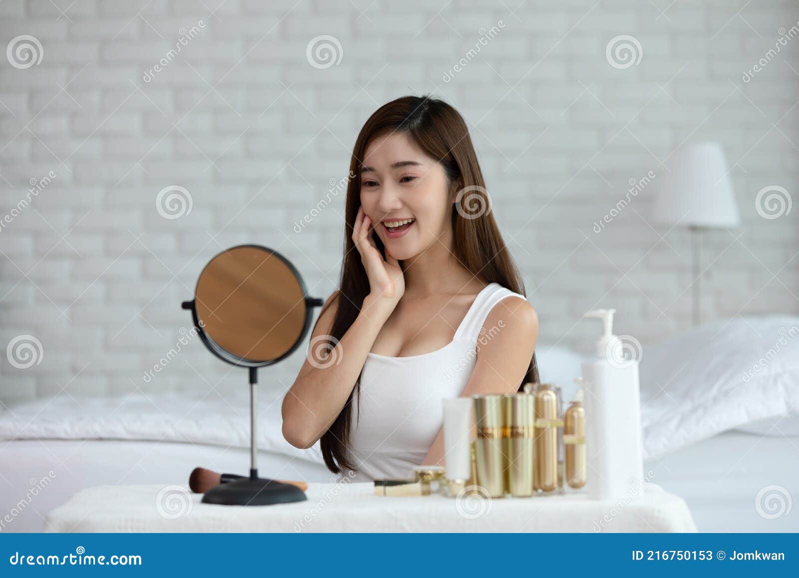 Happy Wellness Asian Young Woman Smile And Looking In Mirror Doing Skin