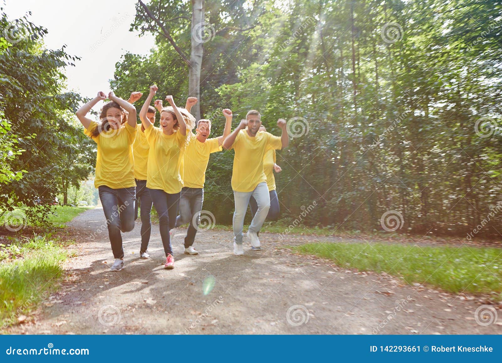 Happy Winner Team is Running Cheering in the Park Stock Image - Image ...