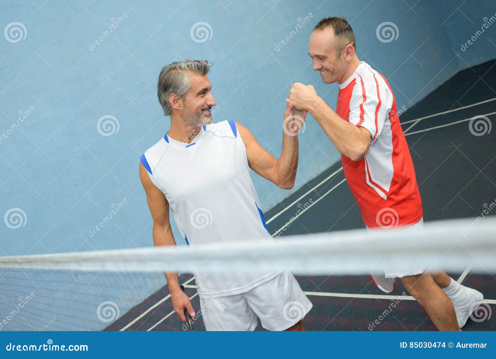 Happy winners in court stock photo. Image of team, tennis - 85030474