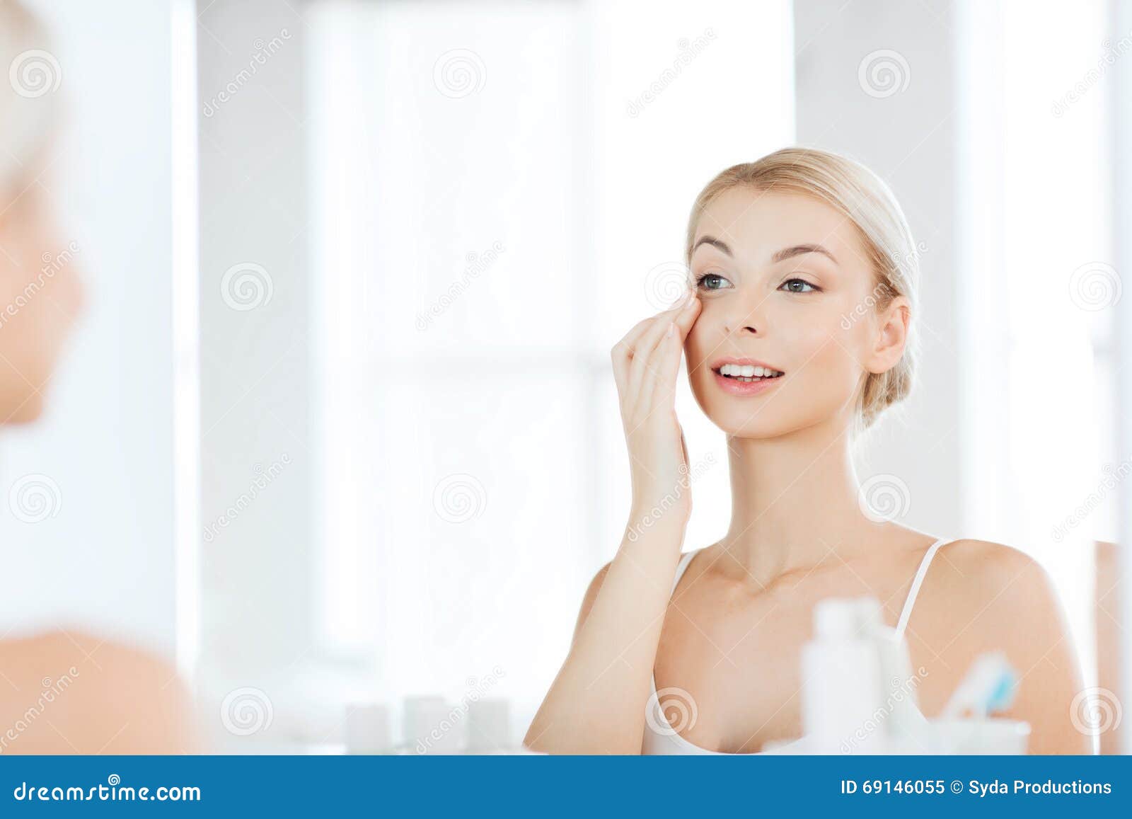 Happy Woman Applying Cream To Face At Bathroom Stock Image Image Of Cream Cheerful 69146055