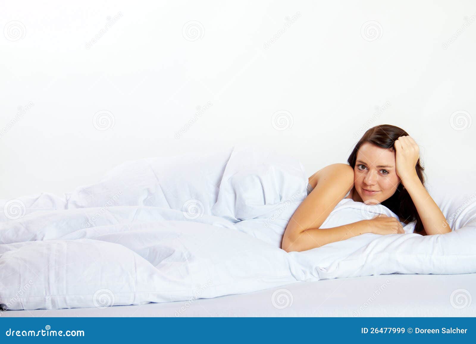 Happy woman in bed stock image. Image of sitting, expression - 26477999