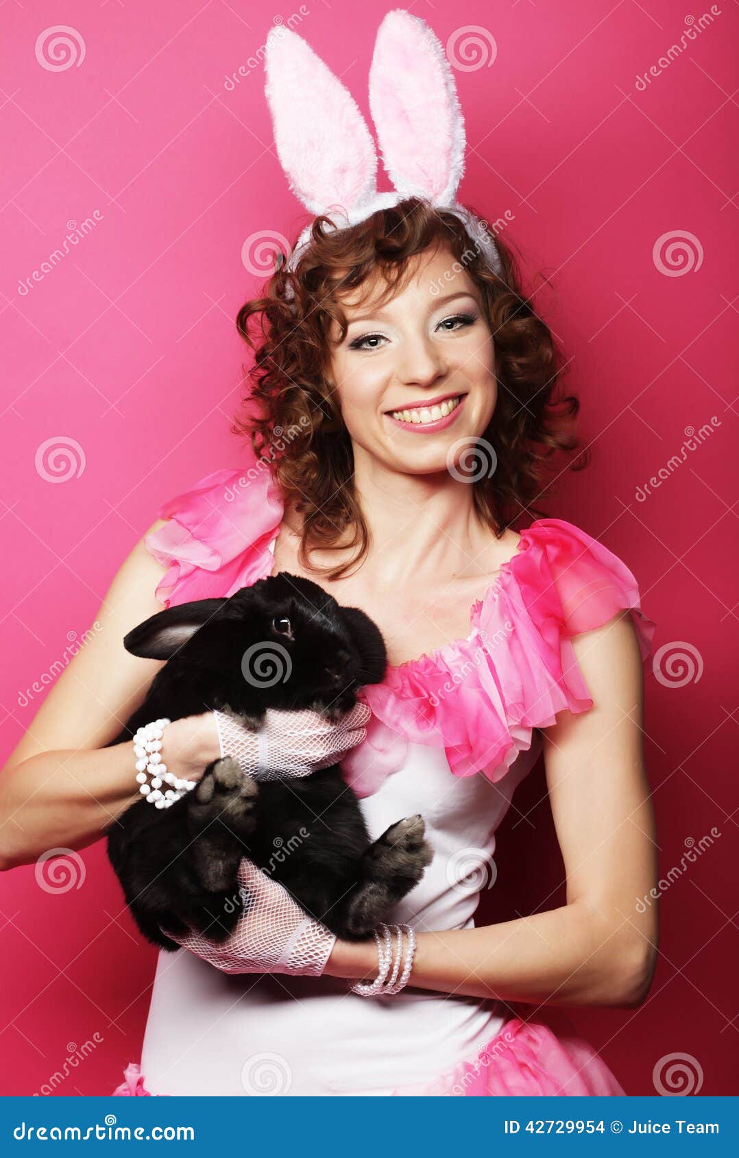Happy Woman with Black Rabbit Stock Photo - Image of brunette, pinup ...