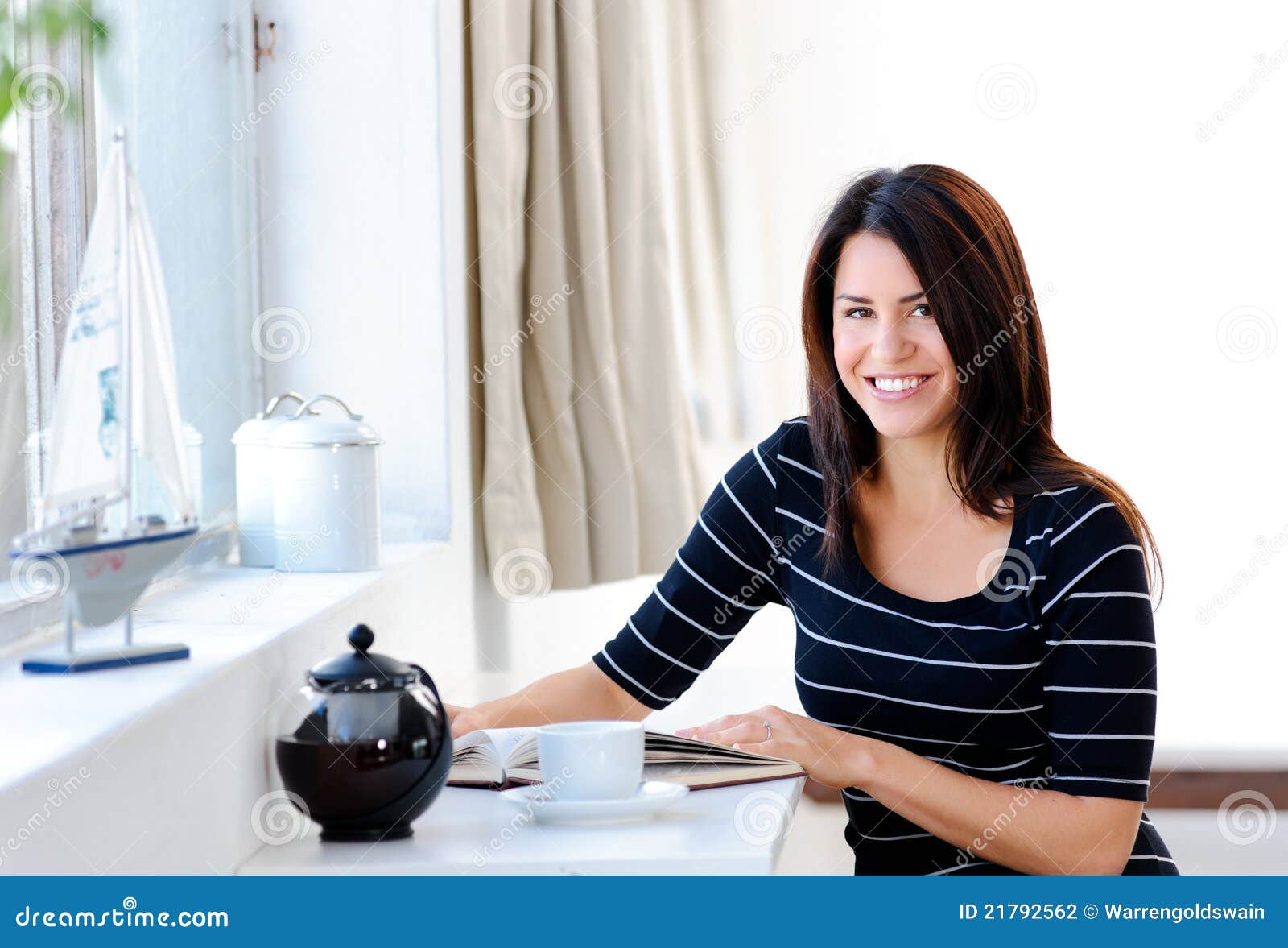 Happy woman with book stock photo. Image of brunette - 21792562