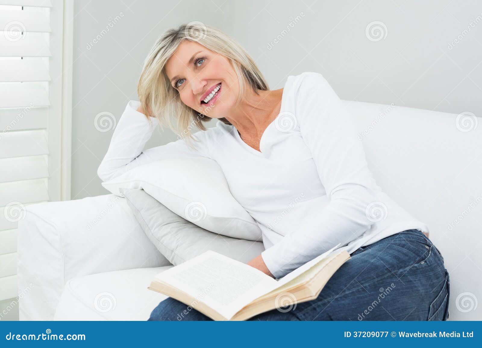 Happy Woman with a Book at Home Stock Image - Image of beautiful ...