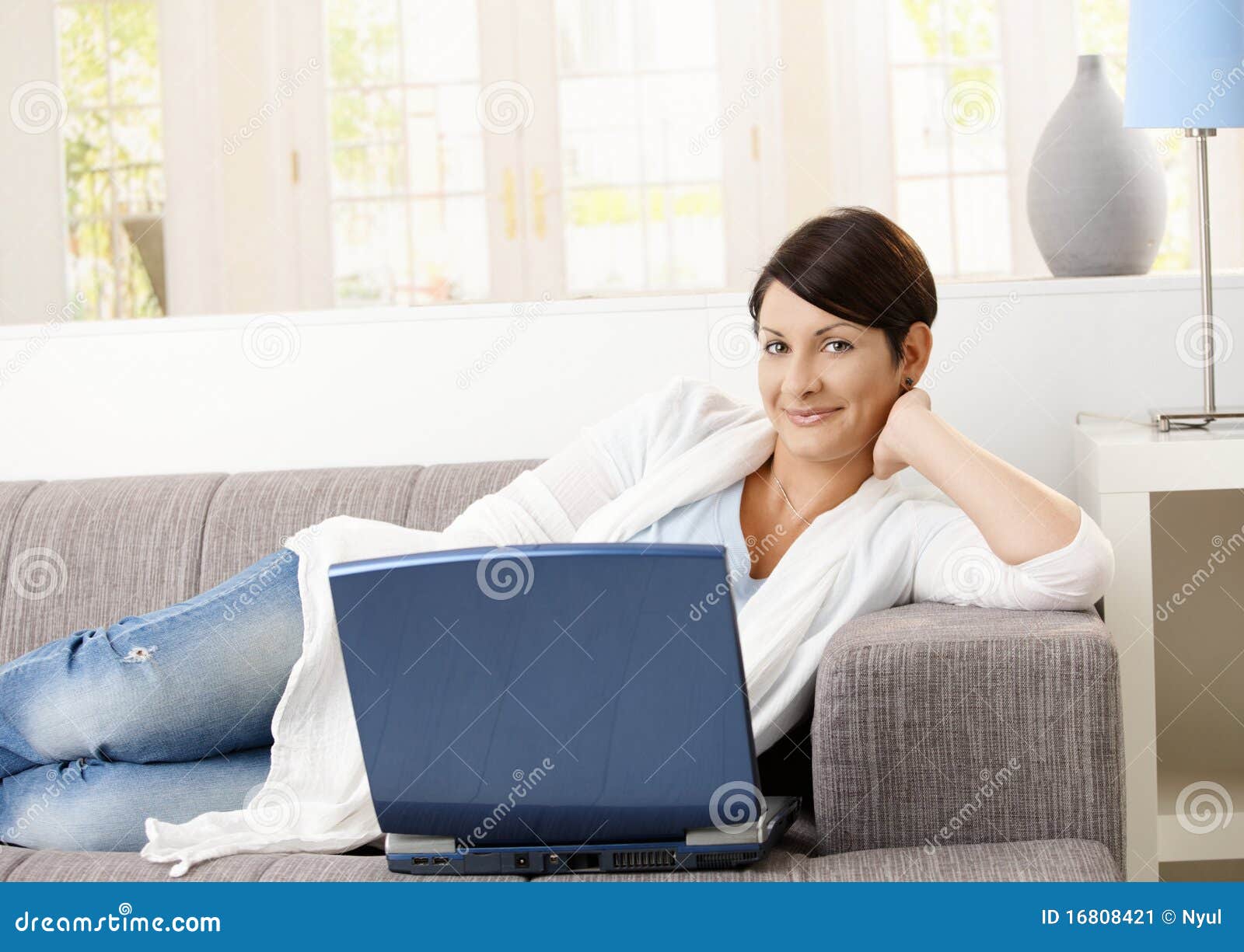 Happy Woman Browsing Internet Stock Image - Image of color, face: 16808421