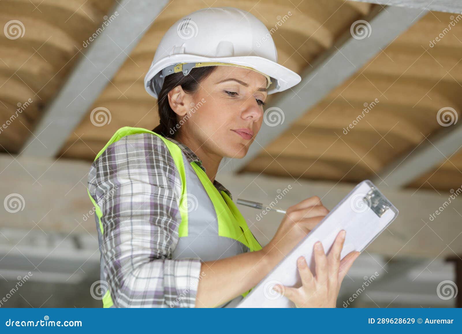 Happy Woman Builder Writing on Clipboard Stock Image - Image of concept ...