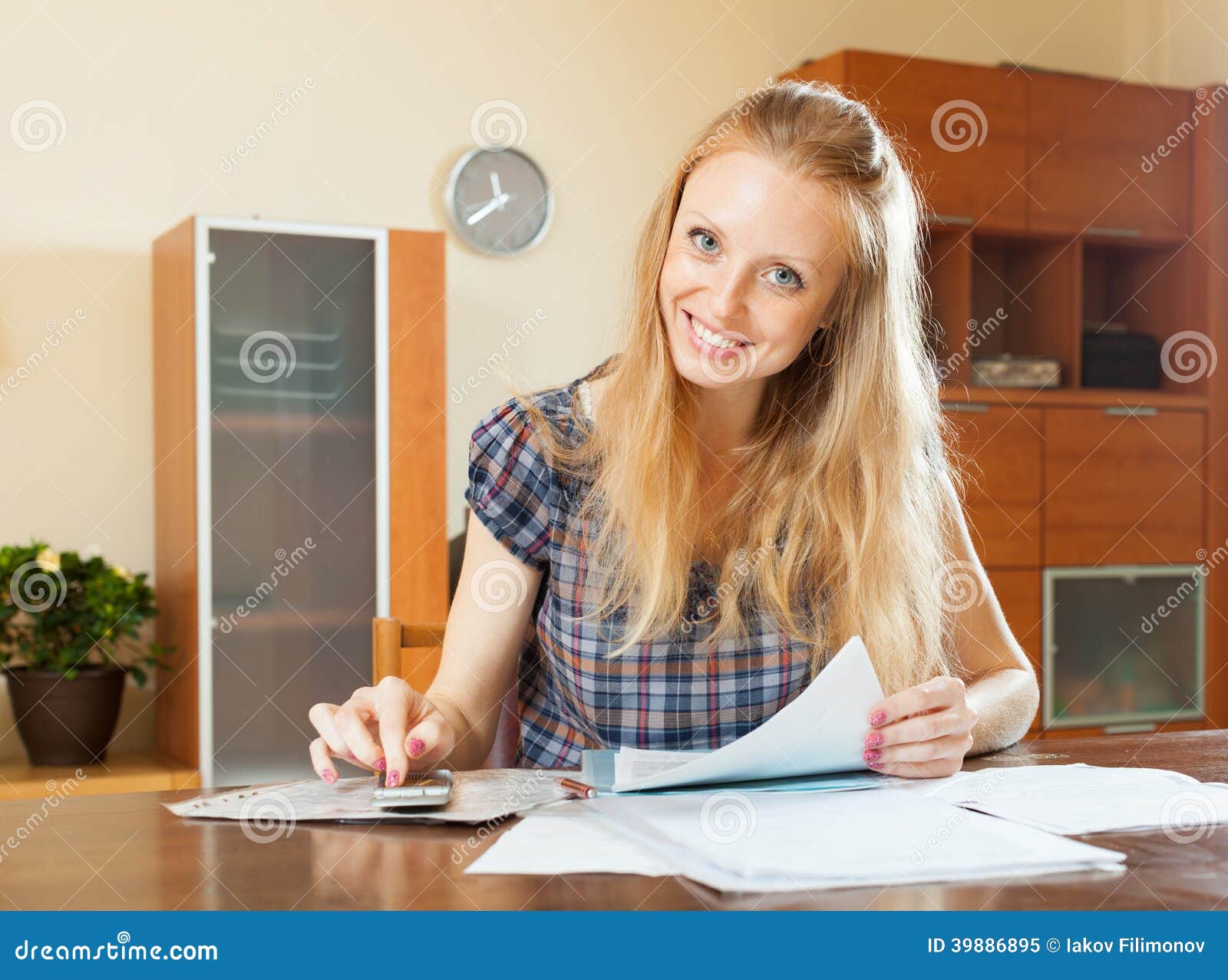 Happy Woman Calculating Something Stock Image - Image of document ...