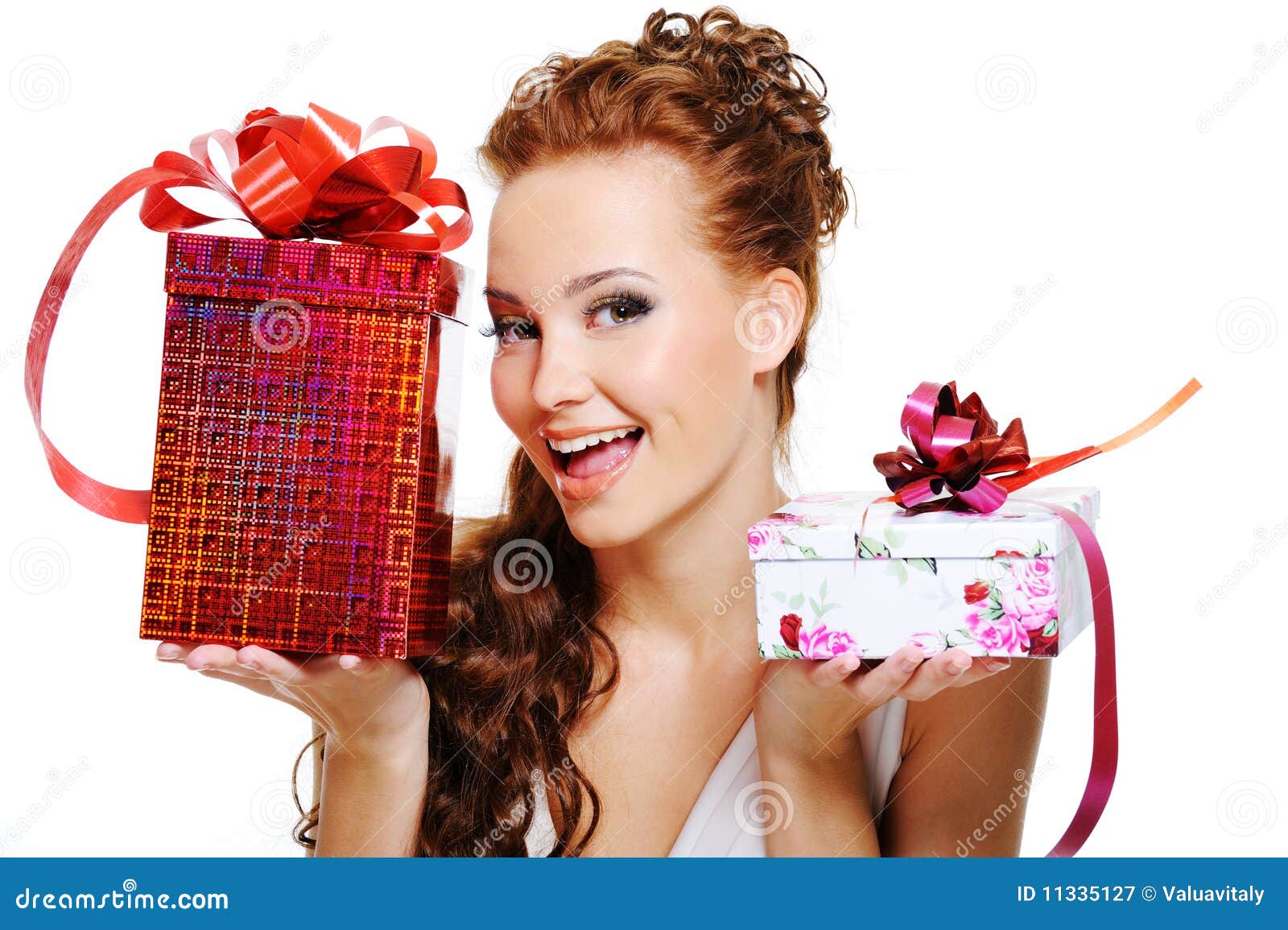 Happy Woman Choosing between Two Presents Stock Image - Image of hold ...