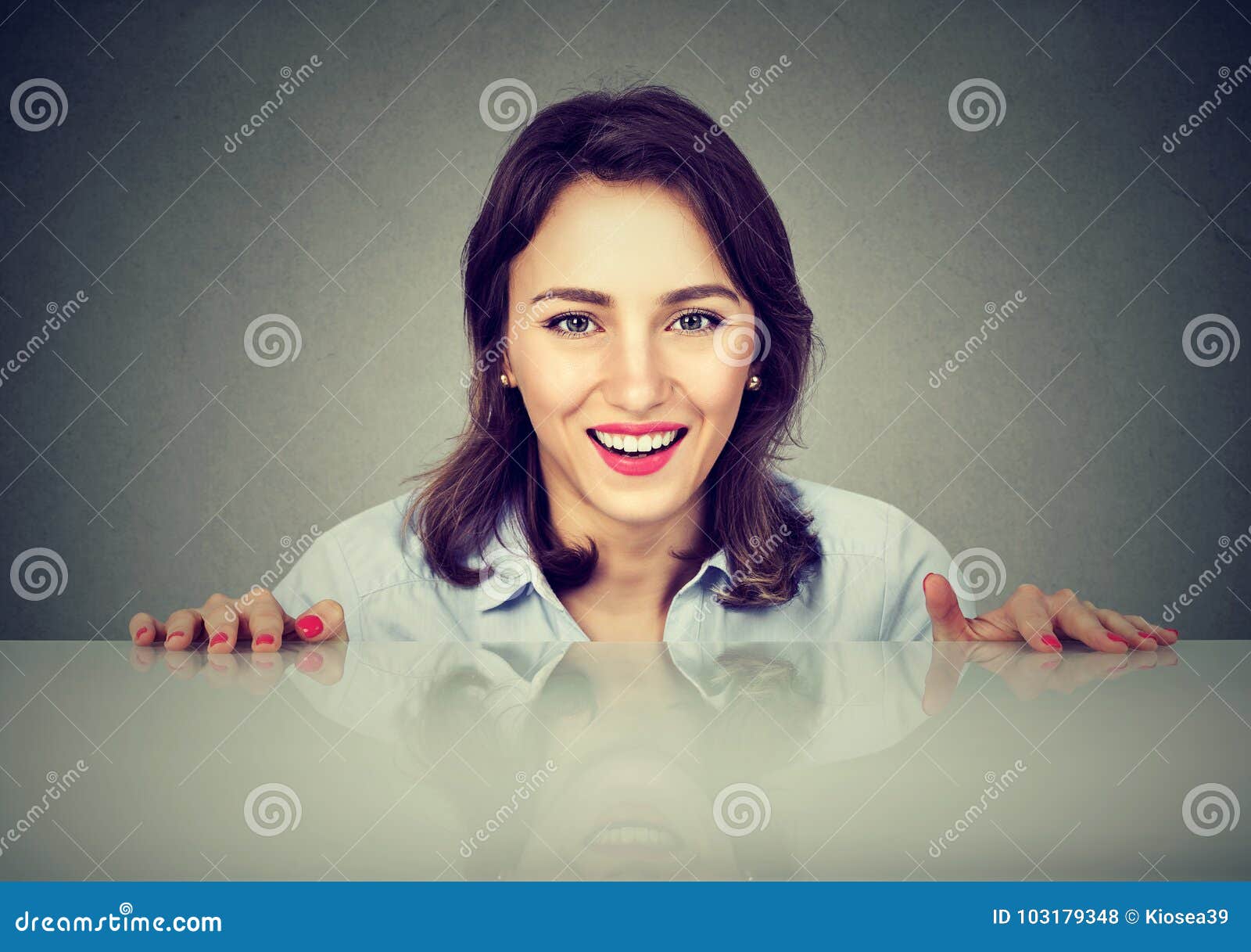 Happy Young Woman Coming Up from Under the Table Stock Photo - Image of ...